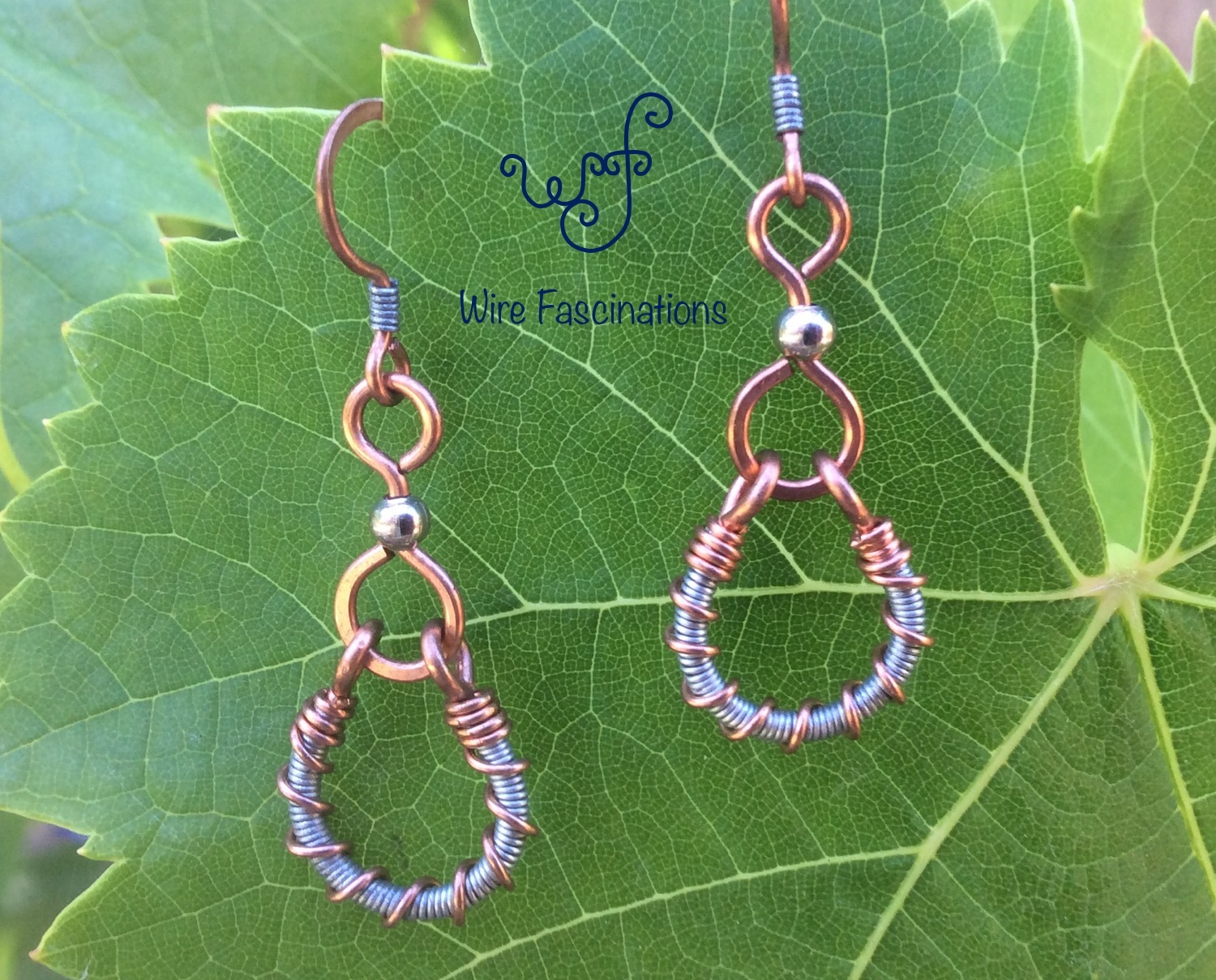 Handmade earrings: mixed metal curved coil with copper and stainless ...