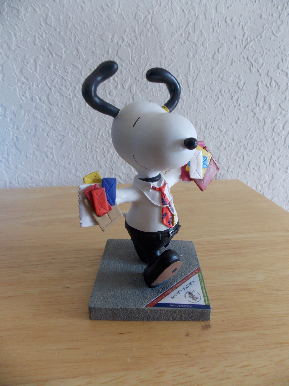 Peanuts on Parade “Snoopy Delivers” Figurine - Figurines