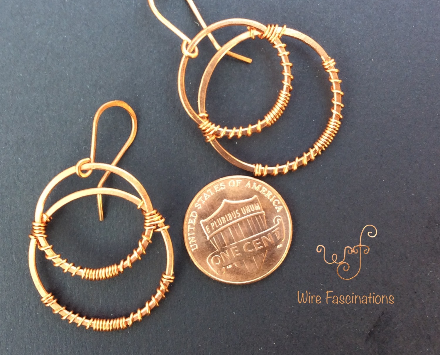 Handmade copper earrings: wire wrapped overlapping hoops - Earrings
