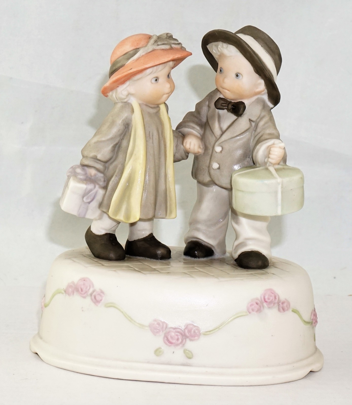 Enesco Music Box Figurine of a Boy and Girl Holding Hands Carrying ...