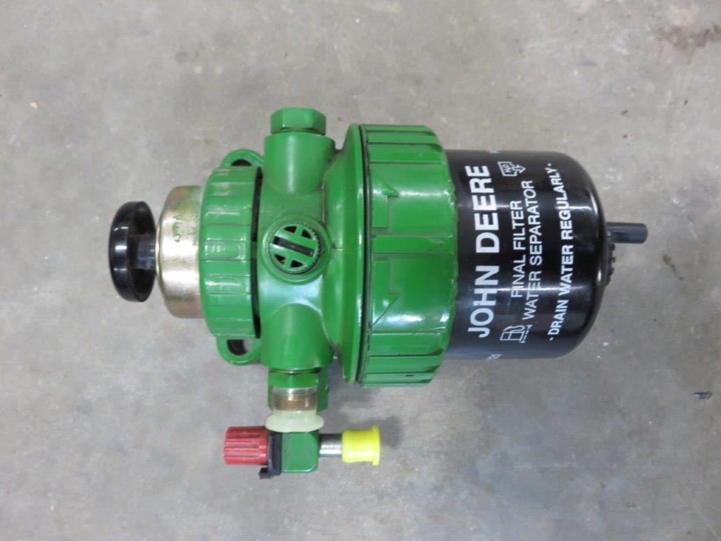 John Deere Fuel Filter Base and Hand Primer Pump Assembly RE67225 - Filters