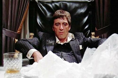Al Pacino sits in chair staring at pile of cocaine on desk Scarface 12x18 Poster - Photographs
