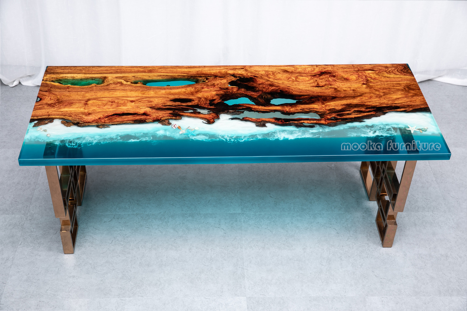 Unique ocean table handmade of clear blue resin with African ambila ...