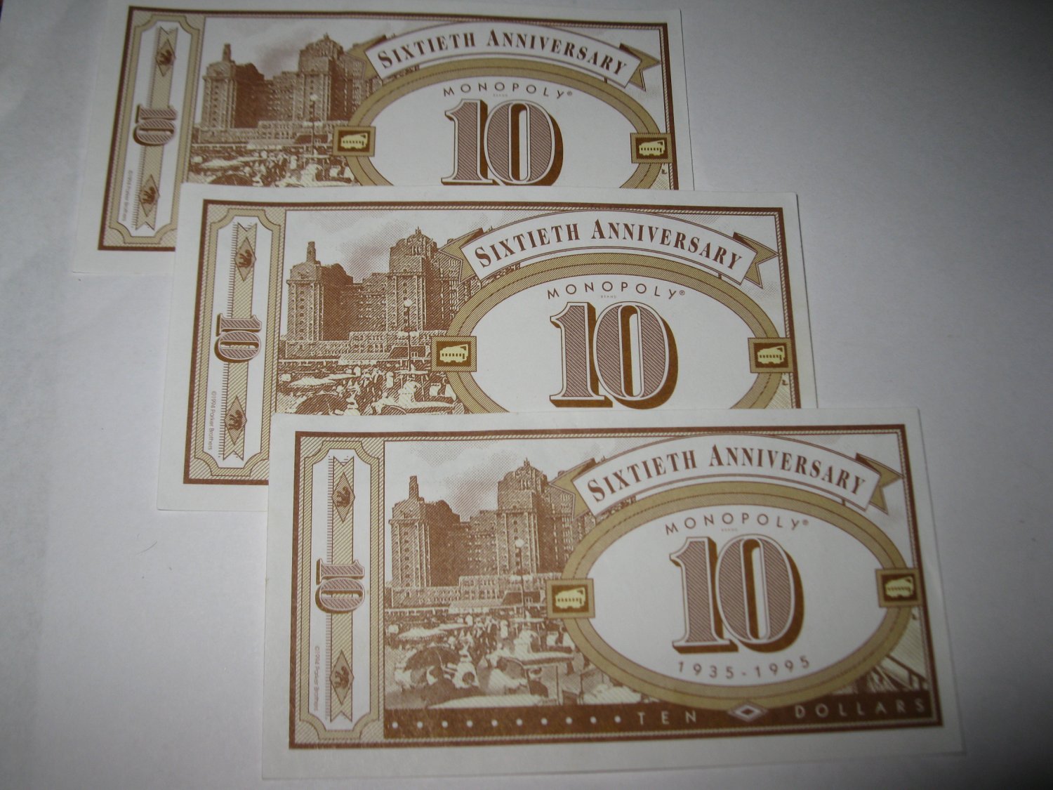 1995 Monopoly 60th Ann. Board Game Piece: stack of money - (3) $10 ...