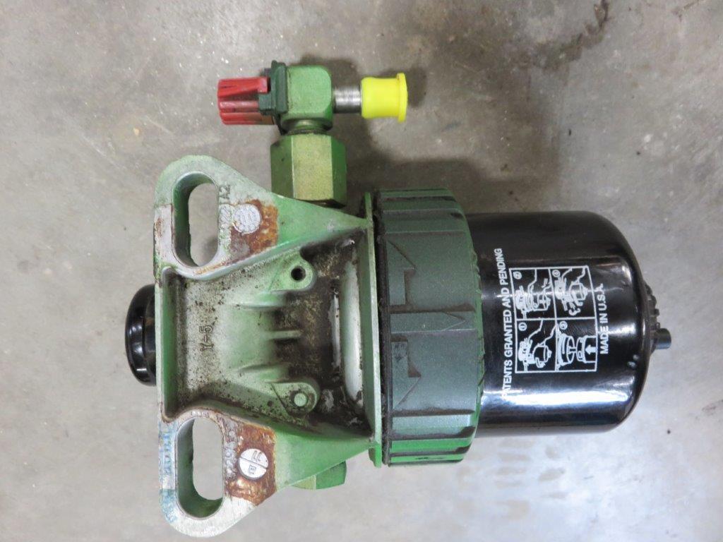 John Deere Fuel Filter Base and Hand Primer Pump Assembly RE67225 - Filters