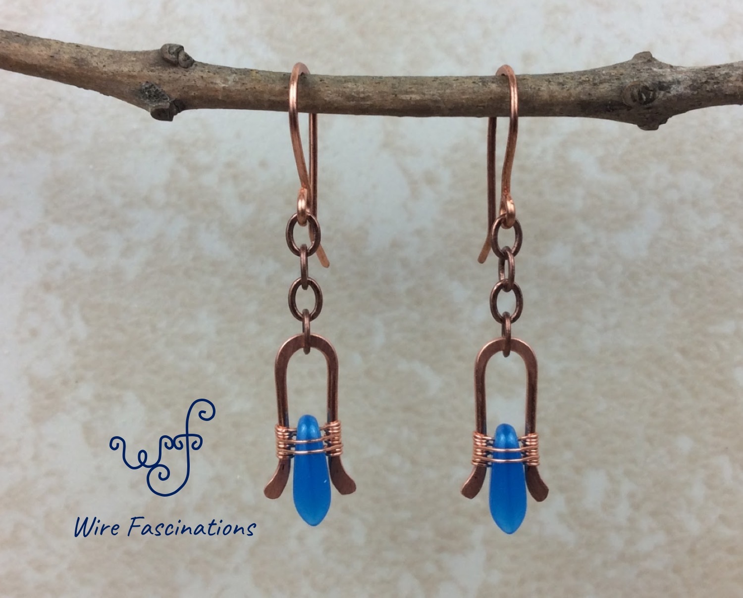 Handmade copper earrings: chain dangling wire wrapped blue glass dagger ...